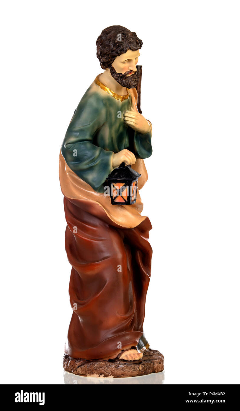 Figure of Saint Joseph of the Nativity scene isoalted on a white ...