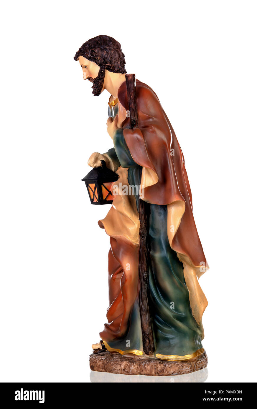 Figure of Saint Joseph of the Nativity scene isoalted on a white ...