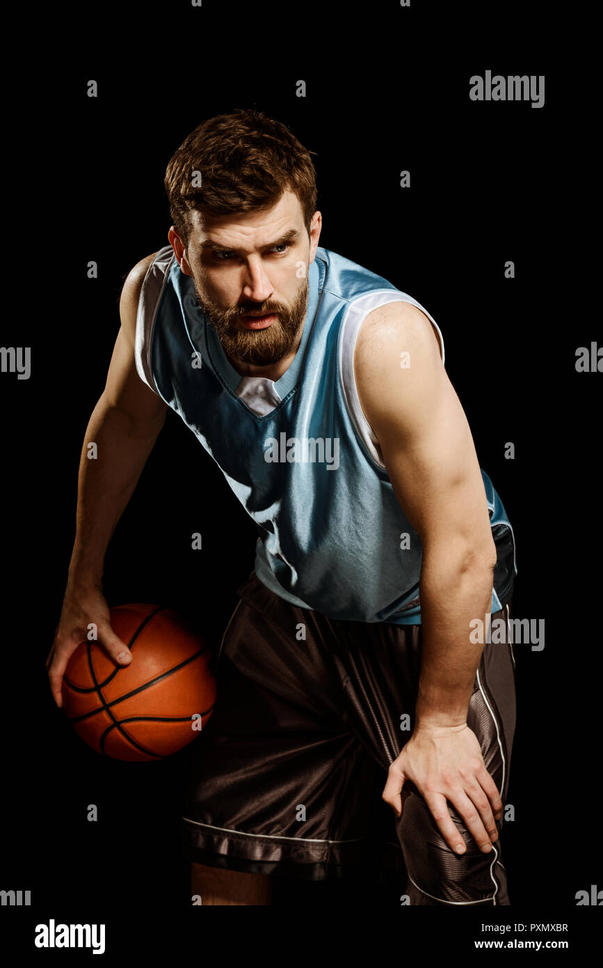 Basketball player resting after game Stock Photo - Alamy