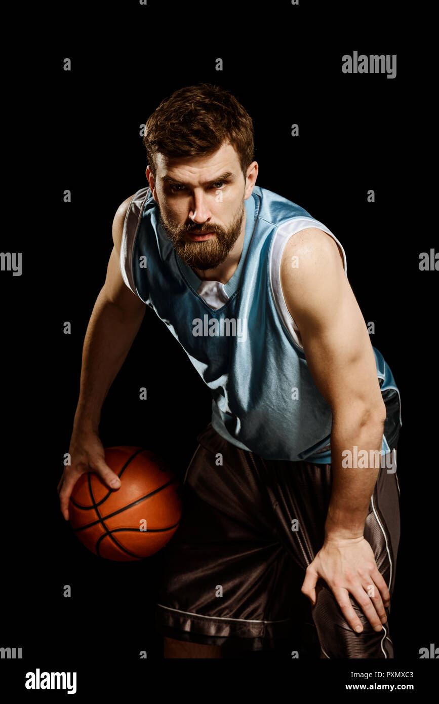 Basketball player with a ball Stock Photo - Alamy