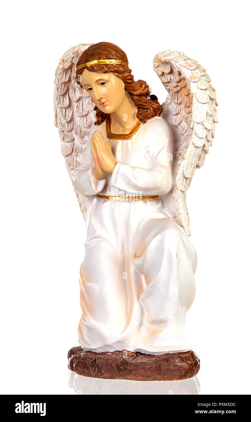 Ceramic figure of the angel of the nativity scene isolated on a white ...