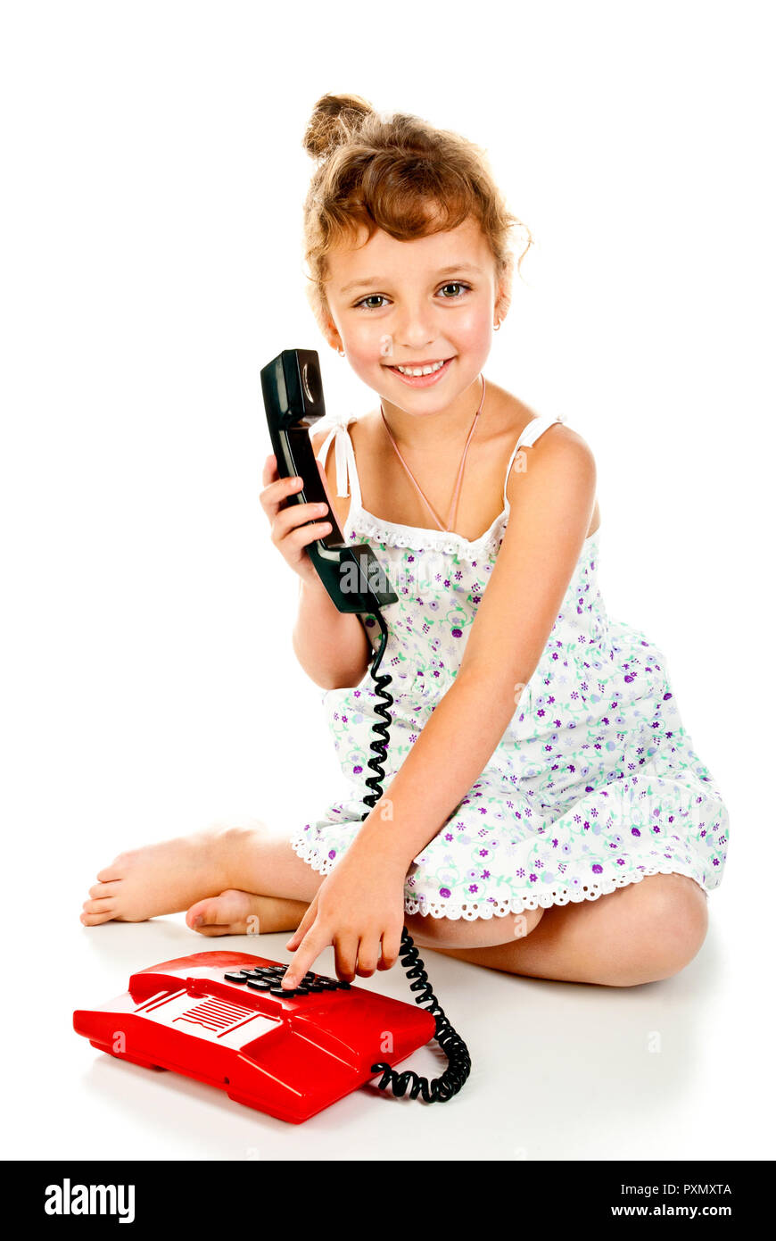 little girl with telephone isolated on a white background Stock Photo ...