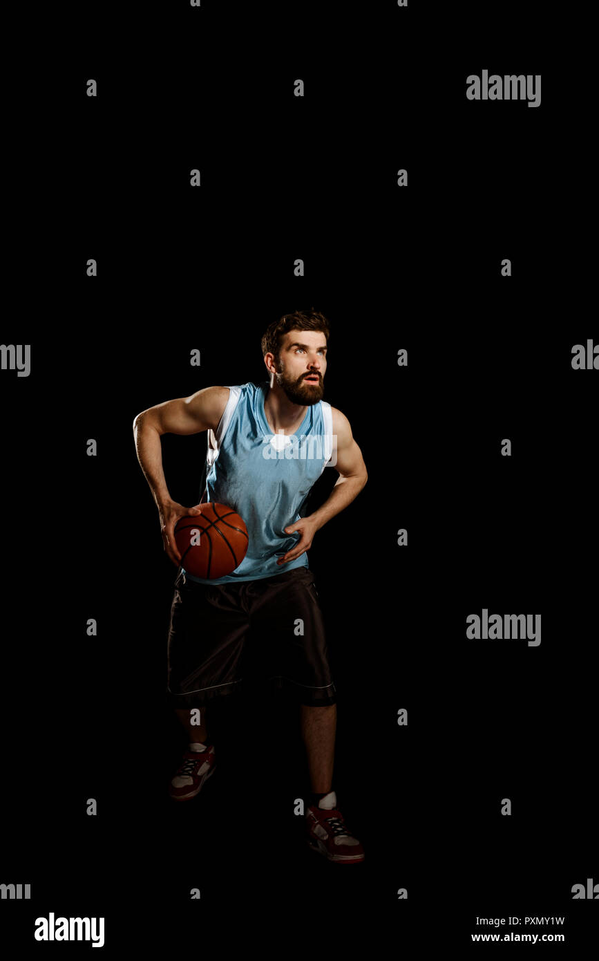 Basketball player preparing to jump Stock Photo - Alamy