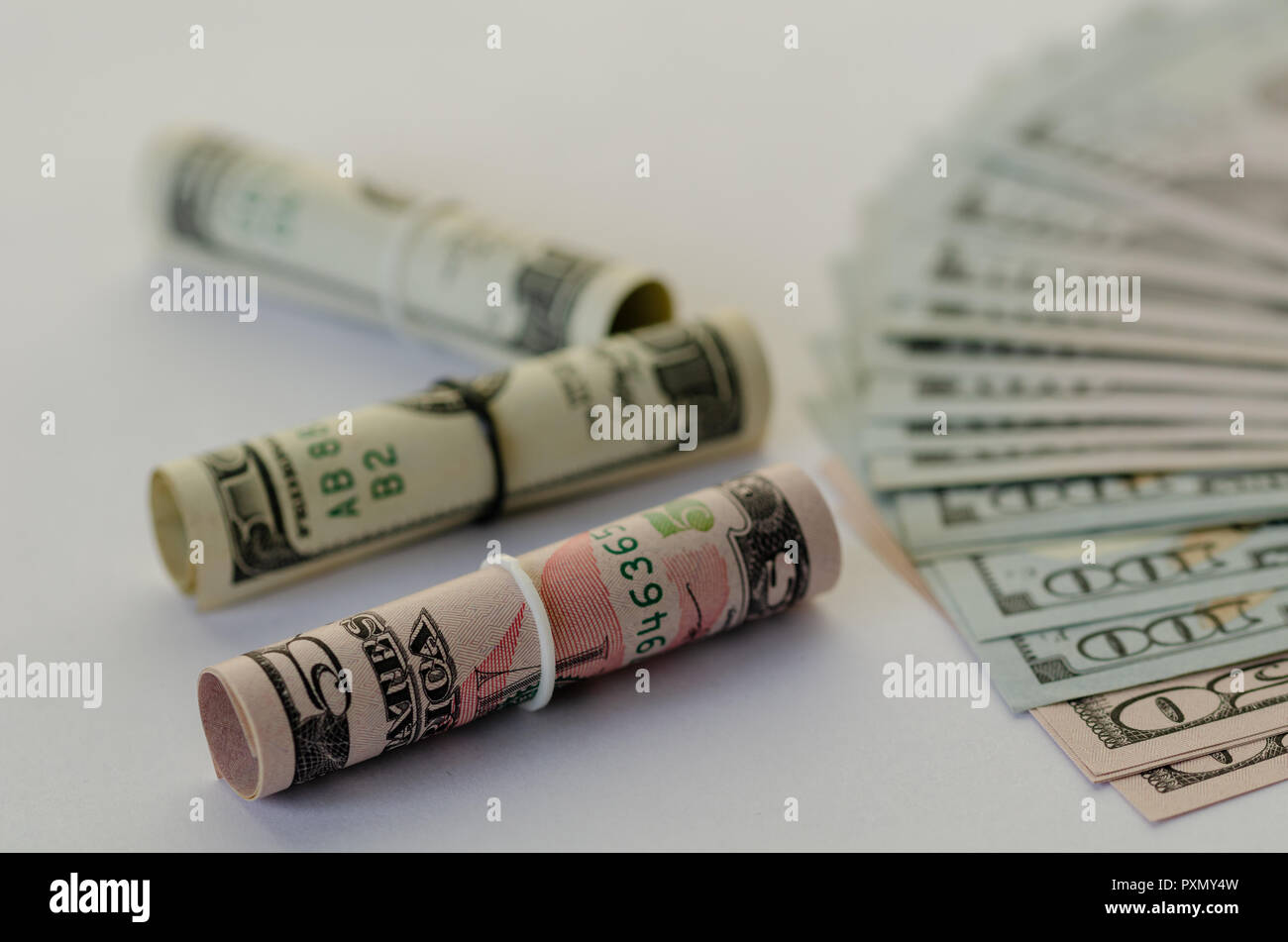 Saving and accumulating dollar banknotes are on white background Stock ...