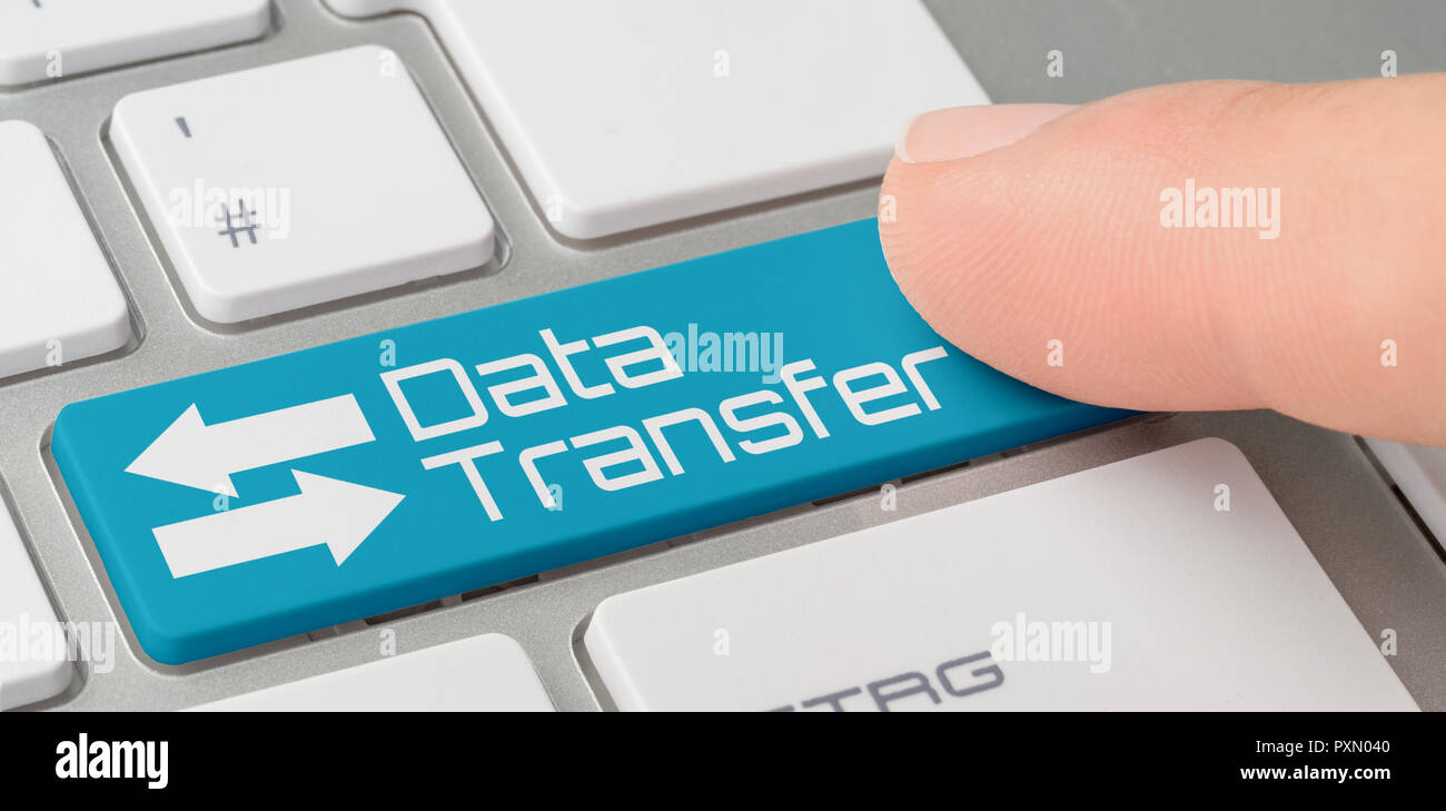 A keyboard with a blue labeled button - Data Transfer Stock Photo - Alamy