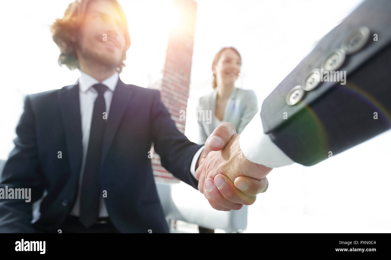 Closeup of a business hand shake Stock Photo - Alamy