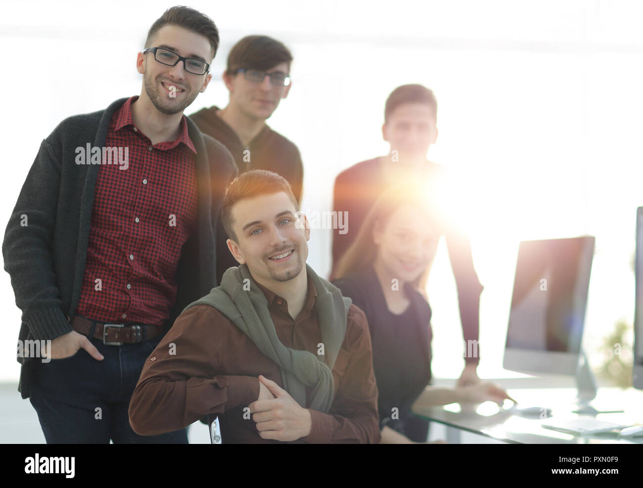 portrait of friendly business team in office Stock Photo - Alamy