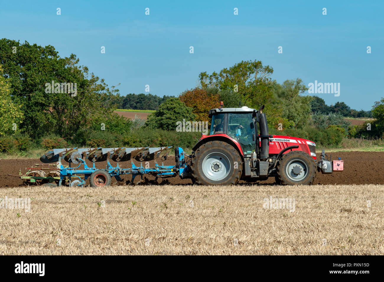 Farm tractor plough stubble field hi-res stock photography and images ...