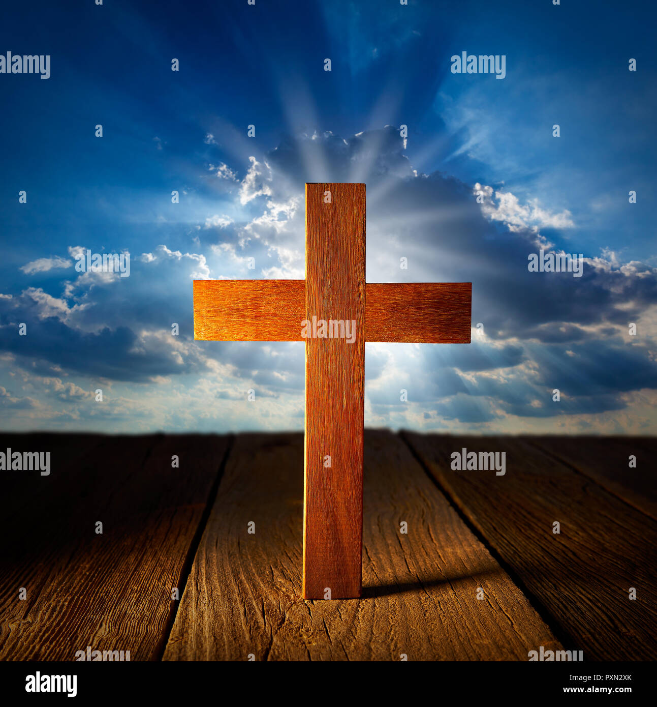 Christian wood cross on blue sky wooden made background Stock Photo - Alamy