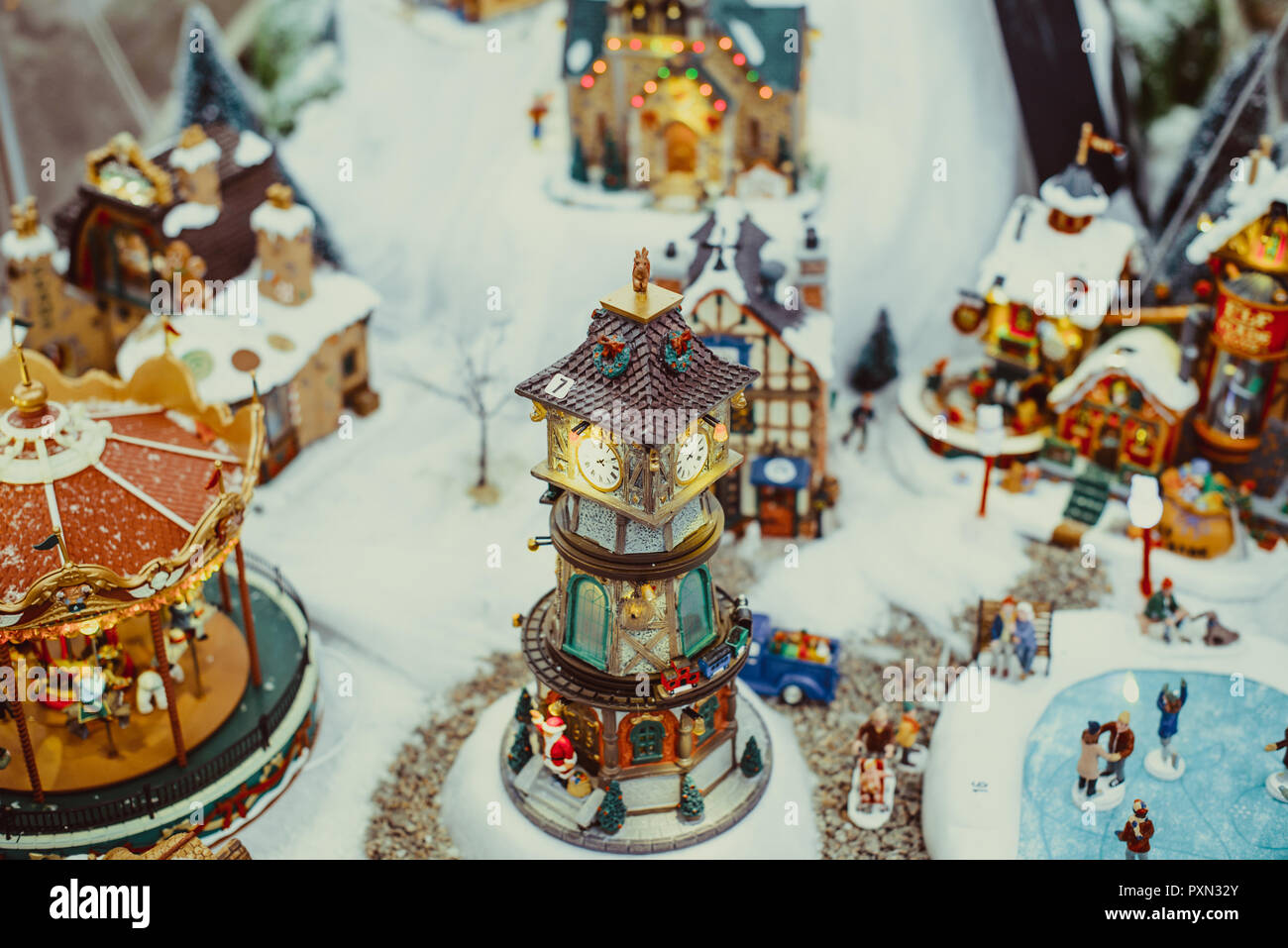 Toy Christmas ceramic miniature with snow-covered city and model of ...