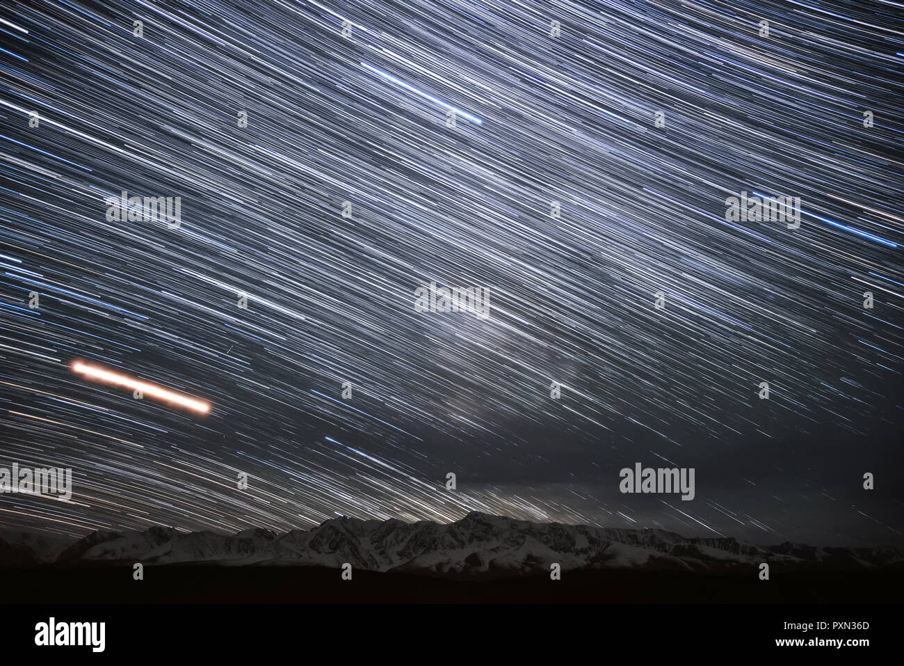 Colorful tracks of stars in the form of tracks in the starry night sky ...