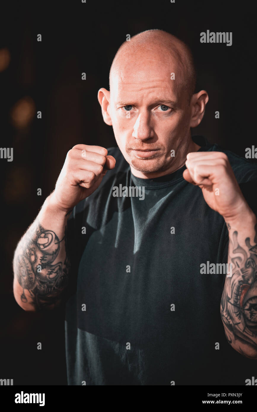 Male MMA Martial Artist fighter on guard with fists up ready to fight ...