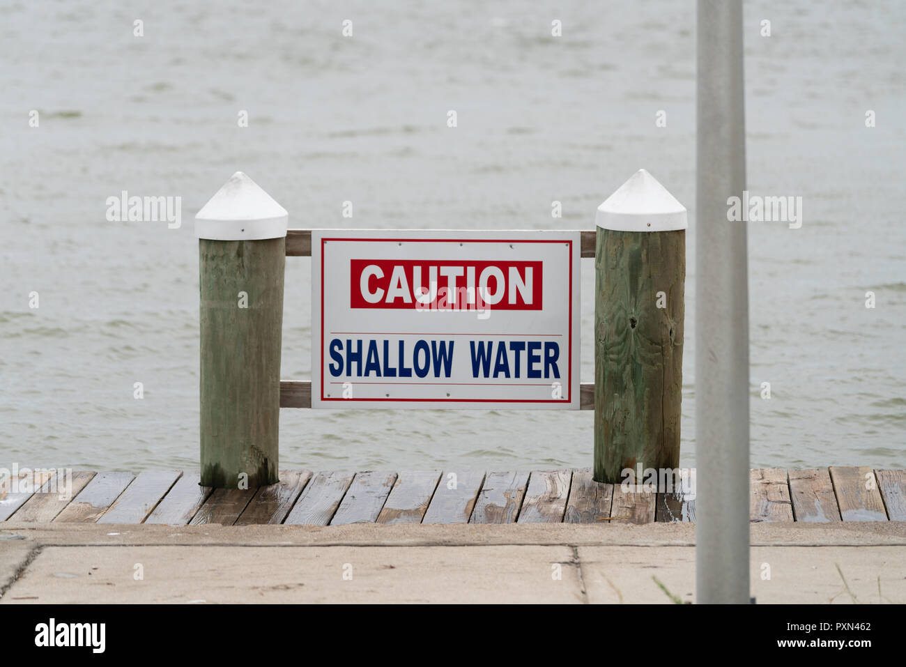 Caution shallow water sign, sign Stock Photo - Alamy