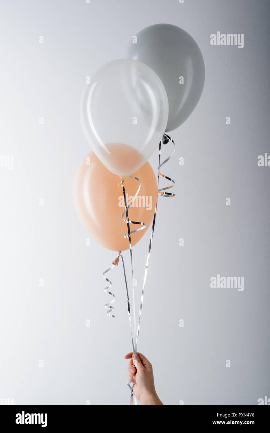Balloons on light grey background Stock Photo - Alamy