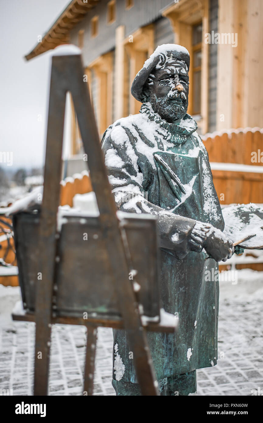 statue of the artist painting a picture is a landmark in the city of ...