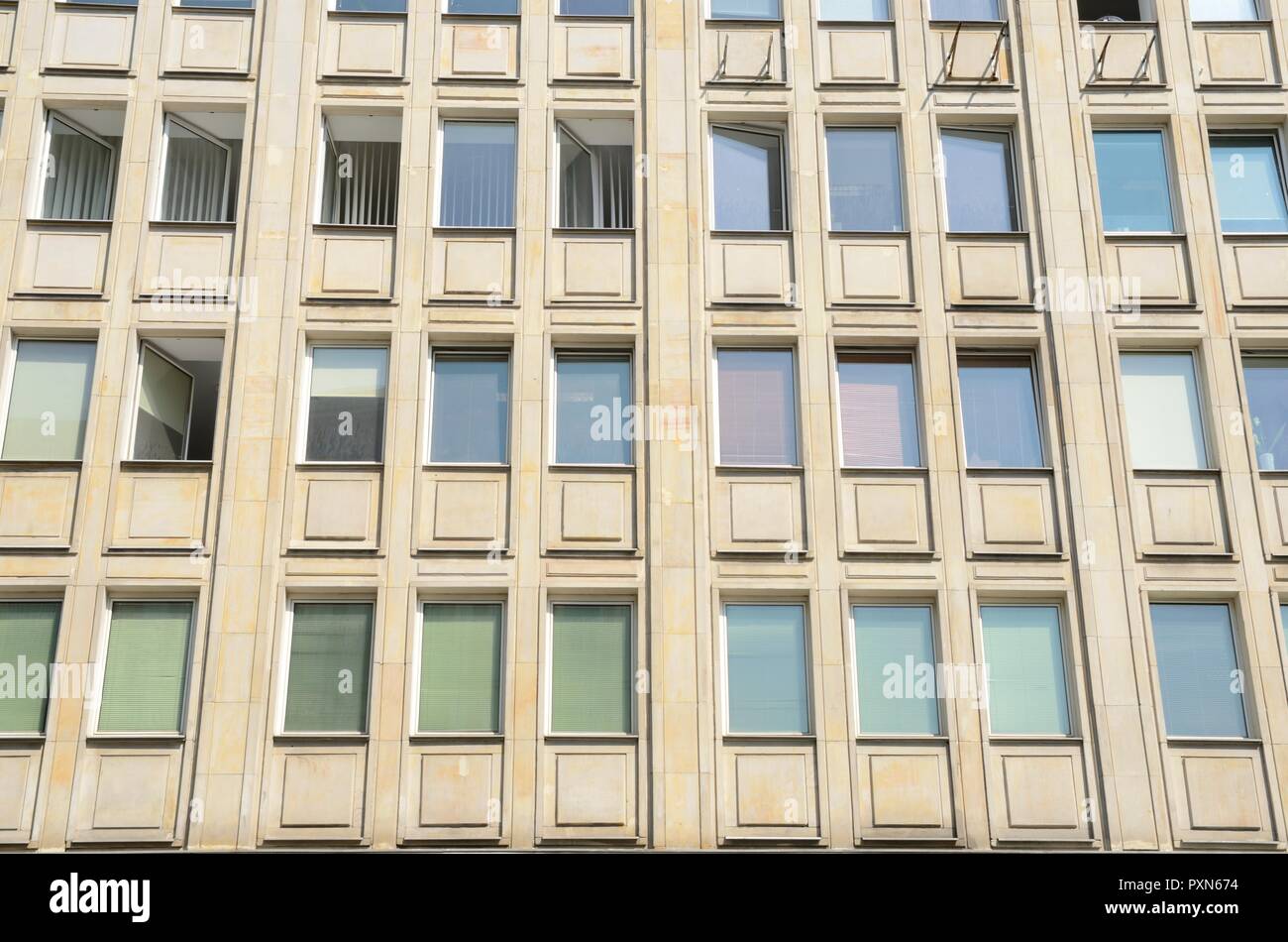 Windows aligned on building facade in Warsaw, Poland Stock Photo - Alamy