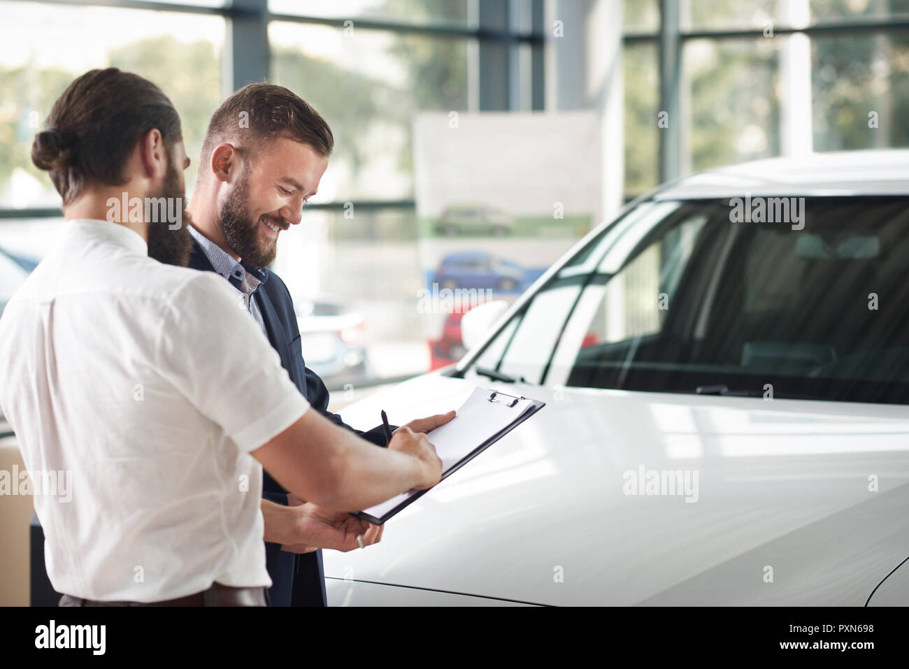 Signing shirt hi-res stock photography and images - Alamy