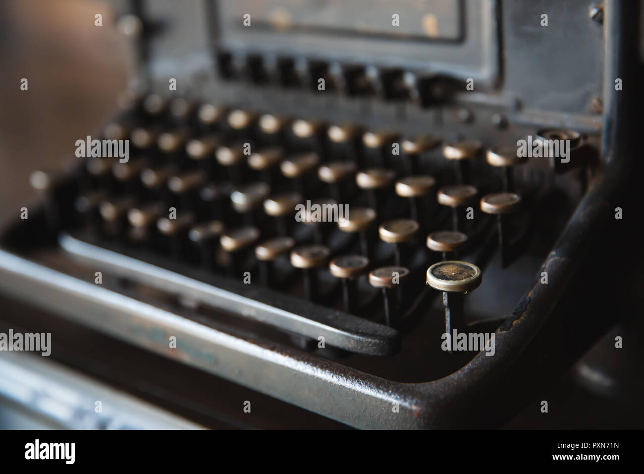 Vintage Black Steel Typewriter with copper buttons Stock Photo - Alamy
