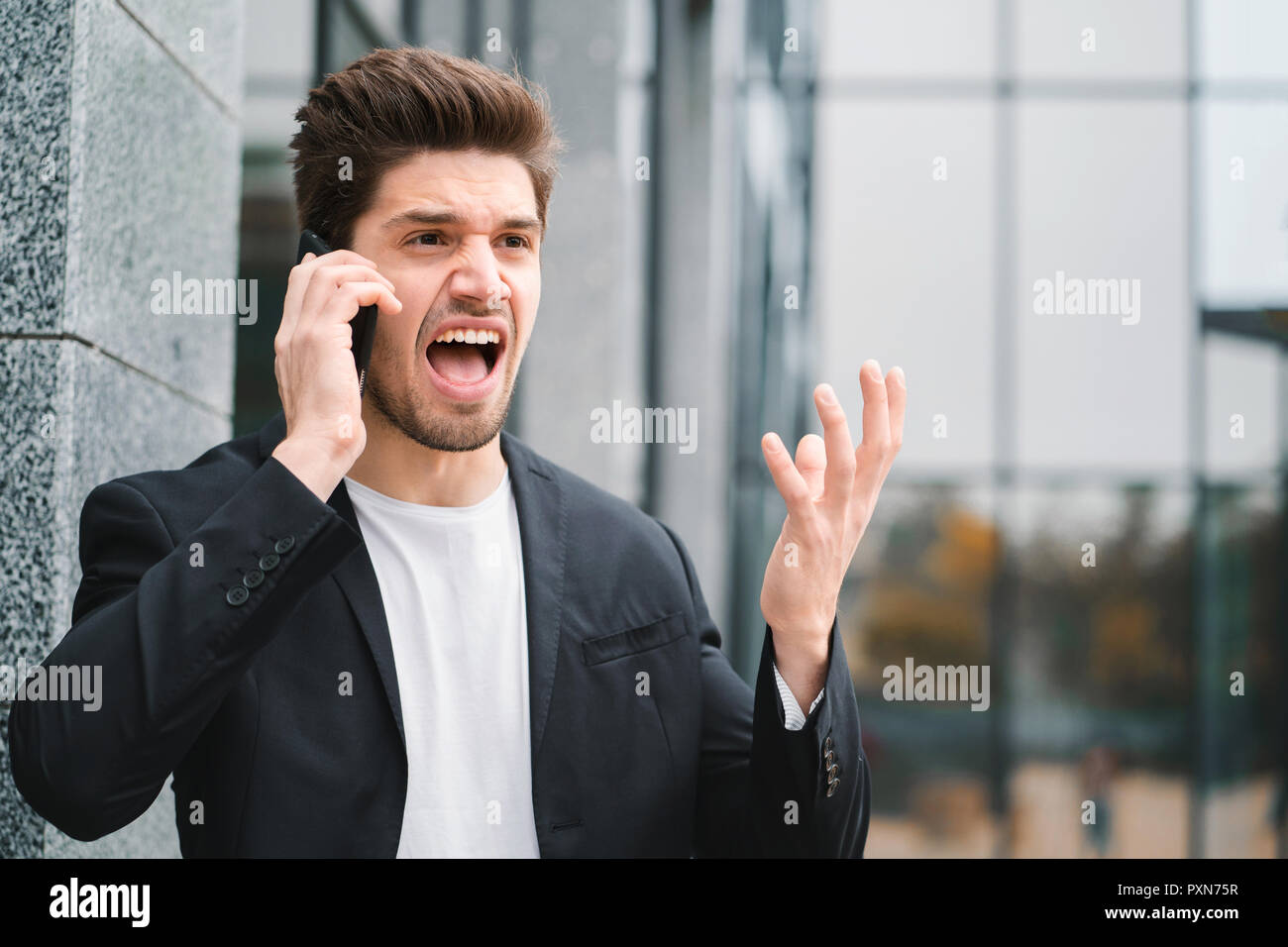 Busy frustrated businessman angry in the office hi-res stock ...