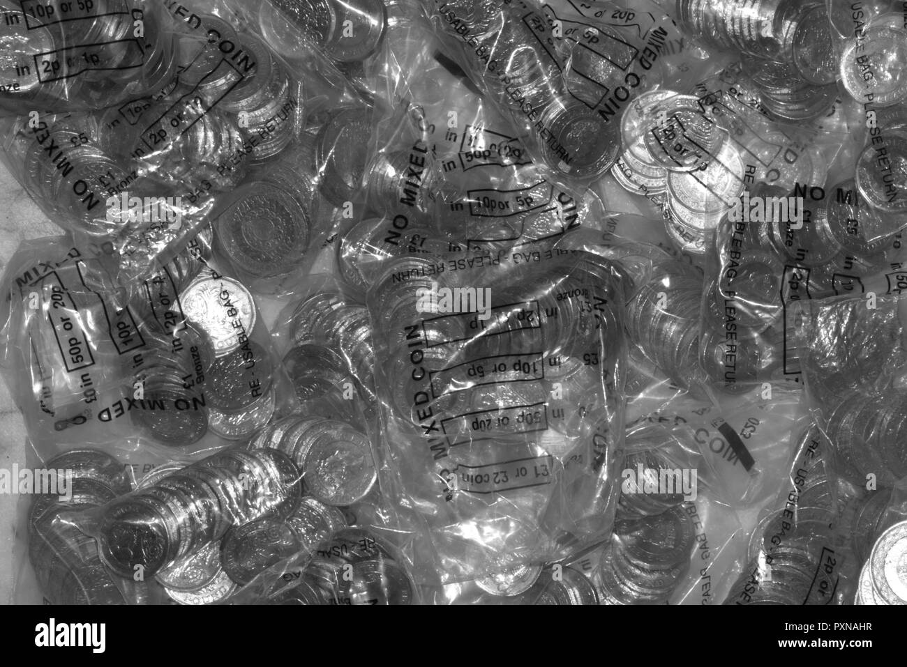 Bags of money Stock Photo - Alamy