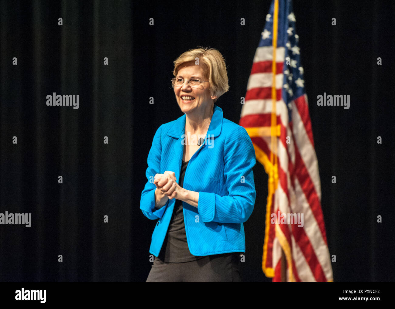 A smiling Senator Elizabeth Warren on stage at a town hall Stock Photo ...