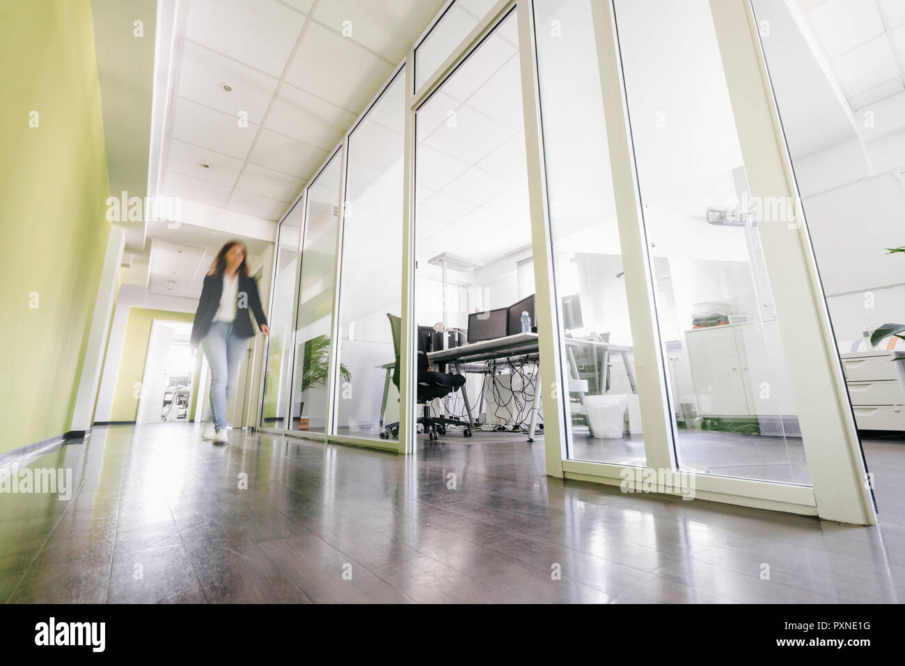 Office worker walking building hi-res stock photography and images - Alamy