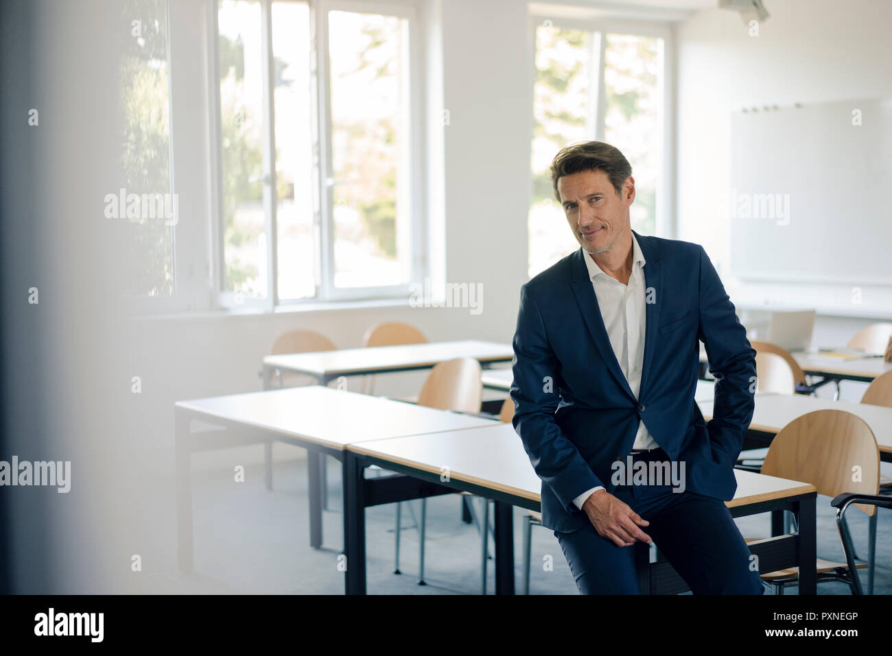 The businessman to sit hi-res stock photography and images - Alamy