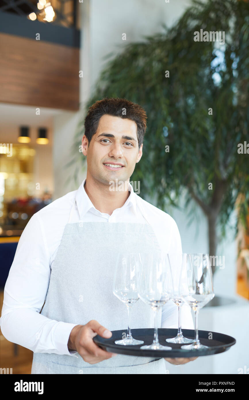 Professional waiter serving empty hi-res stock photography and images ...