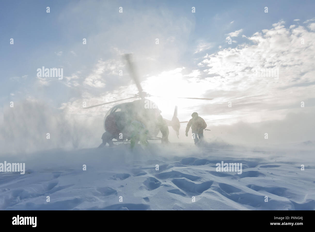 Helicopter landing on mountain top hi-res stock photography and images ...