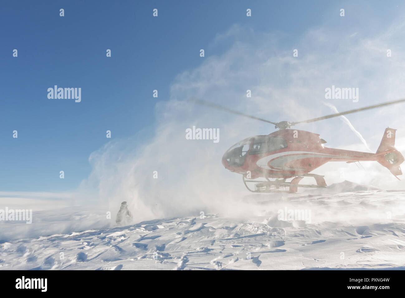 Helicopter landing on mountain top hi-res stock photography and images ...