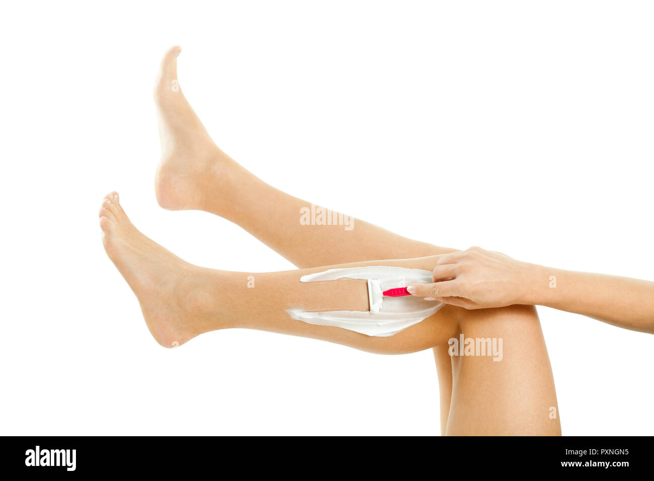 Woman shaving her legs Stock Photo - Alamy