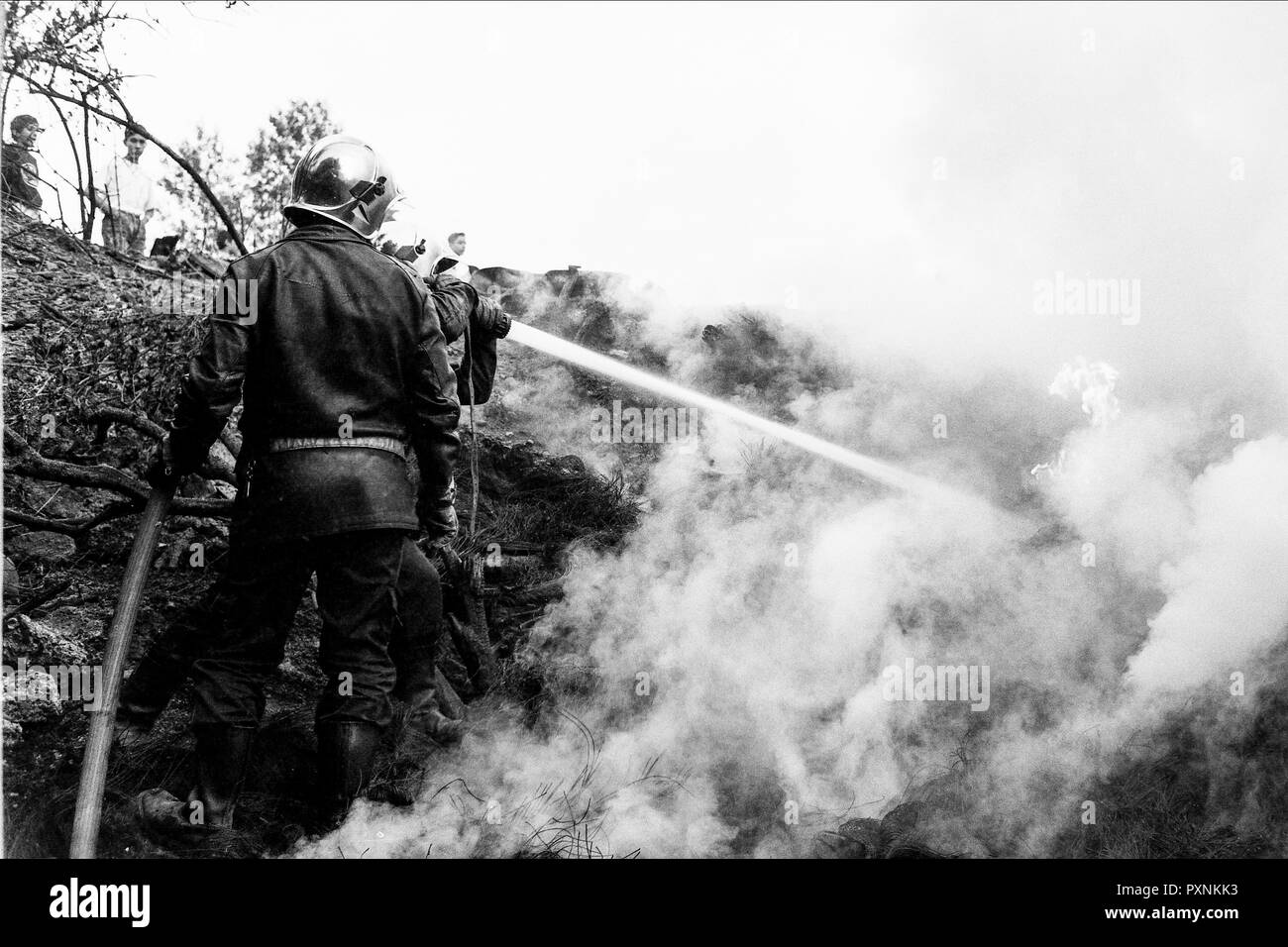 Archives 90ies: Firefighters extinguish tires fire, Lyon, France Stock ...