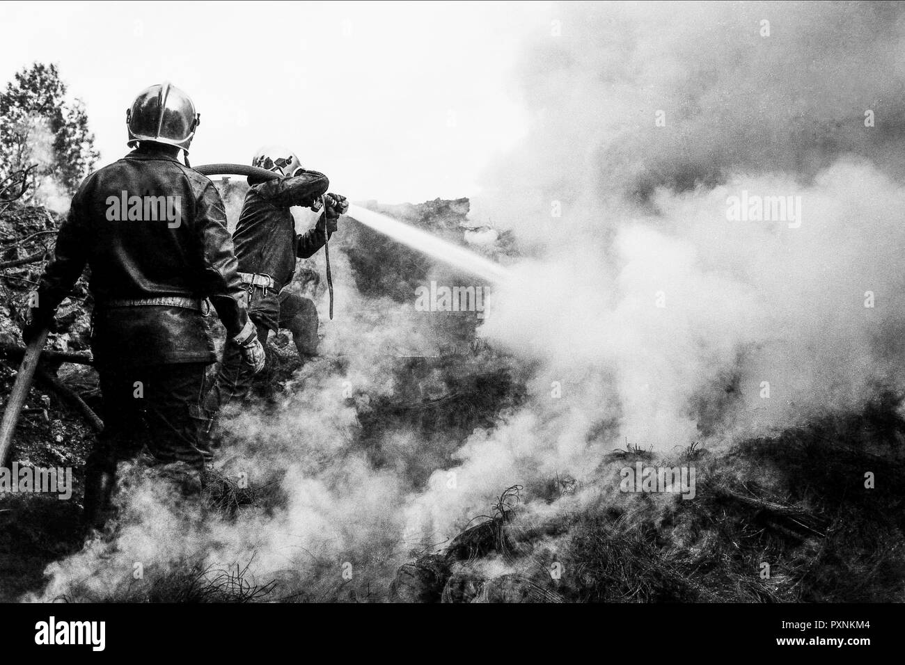 Archives 90ies: Firefighters extinguish tires fire, Lyon, France Stock ...