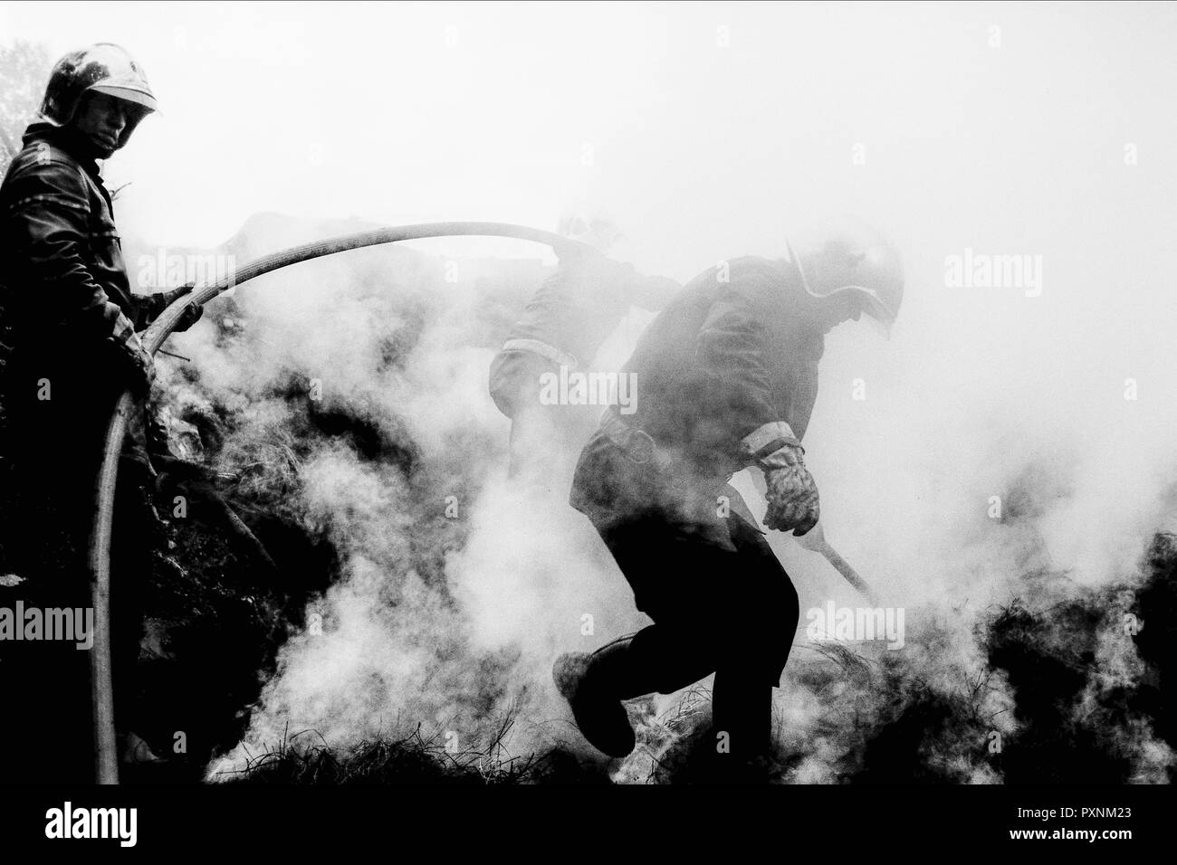 Archives 90ies: Firefighters extinguish tires fire, Lyon, France Stock ...