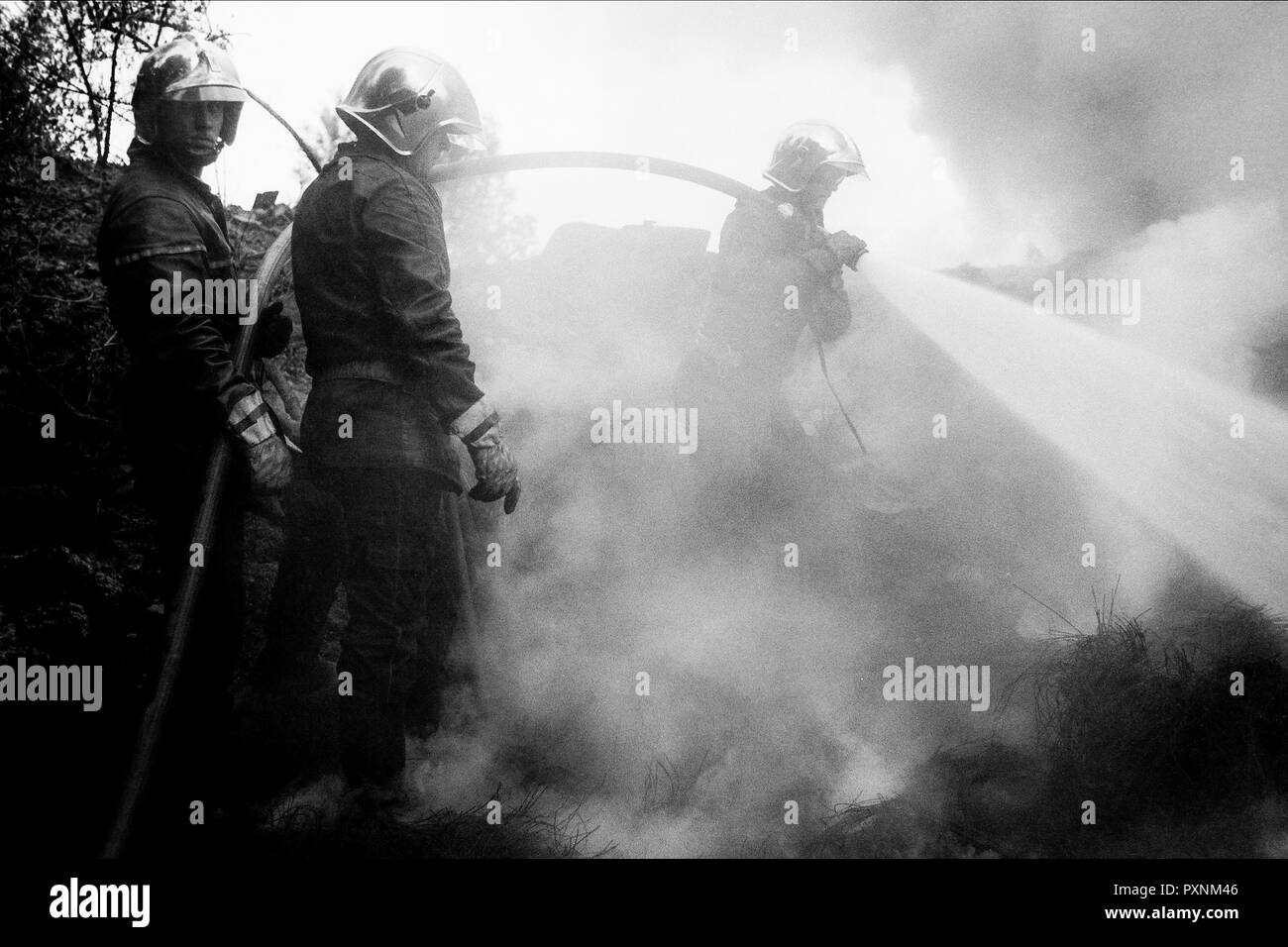 Archives 90ies: Firefighters extinguish tires fire, Lyon, France Stock ...