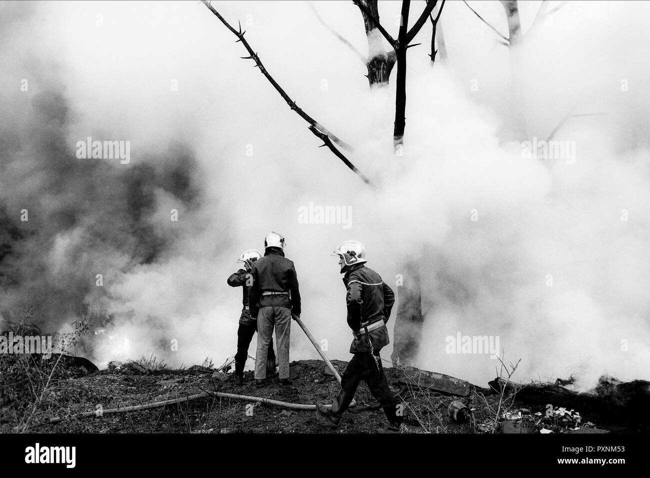 Archives 90ies: Firefighters extinguish tires fire, Lyon, France Stock ...