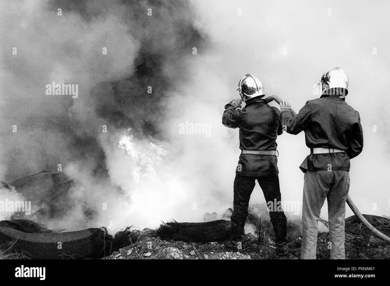 Archives 90ies: Firefighters extinguish tires fire, Lyon, France Stock ...
