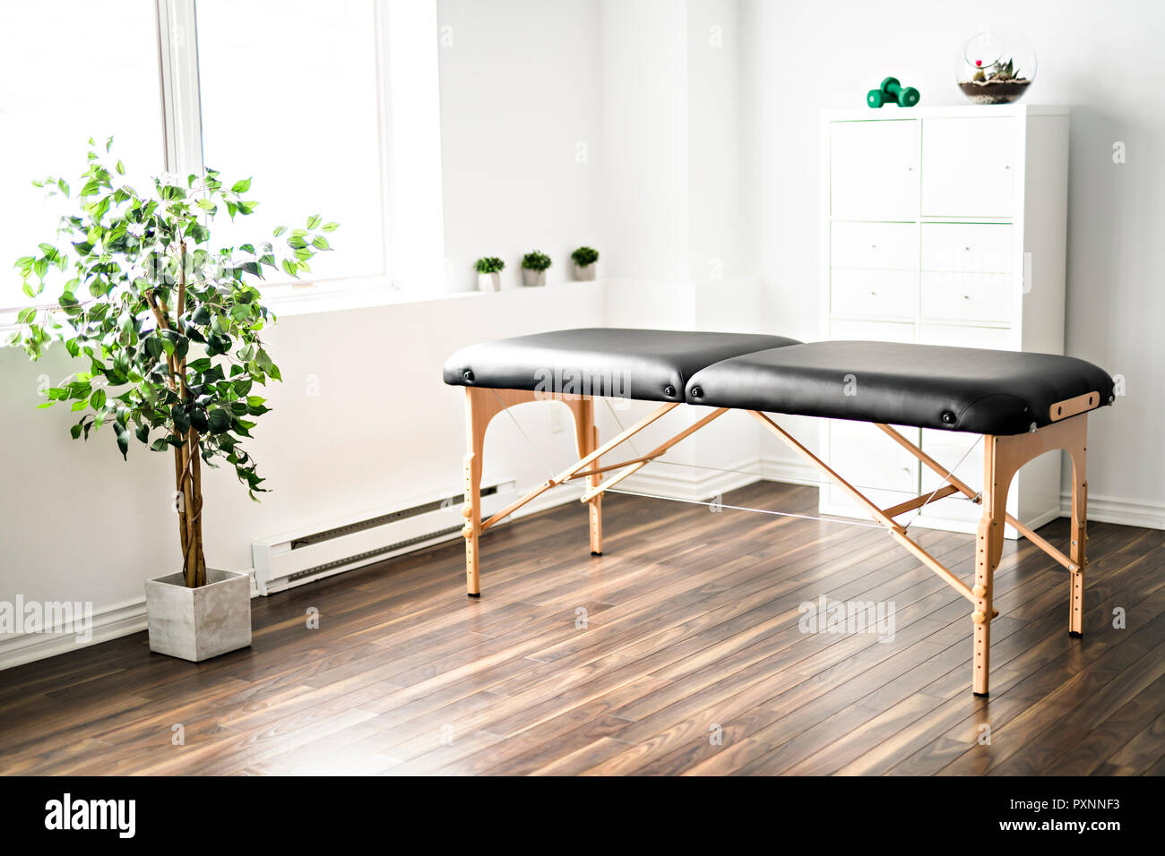 A physiotherapy room with table at work Stock Photo - Alamy