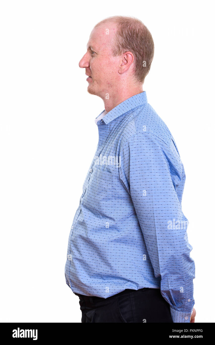 Profile view portrait of businessman with hands on back Stock Photo - Alamy