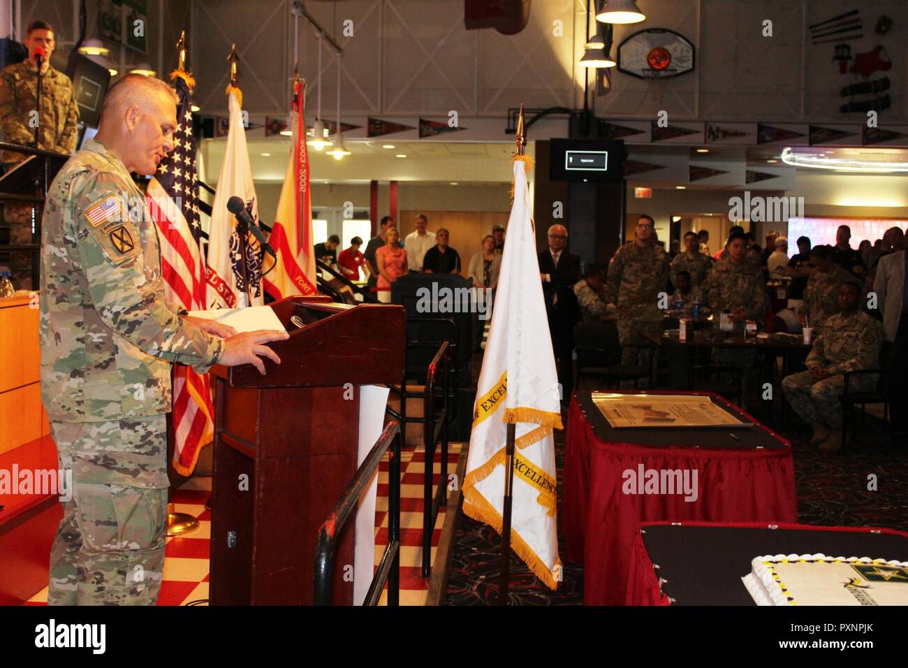 Garrison Commander Col. David J. Pinter Sr. delivers the main message ...
