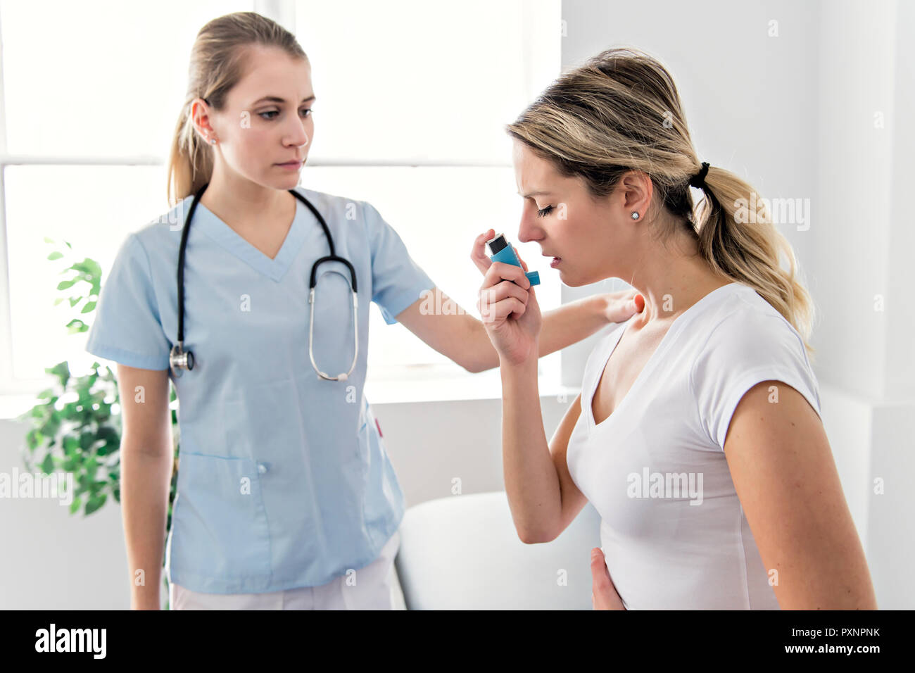 Asthma Woman with doctor at the hospital Stock Photo - Alamy