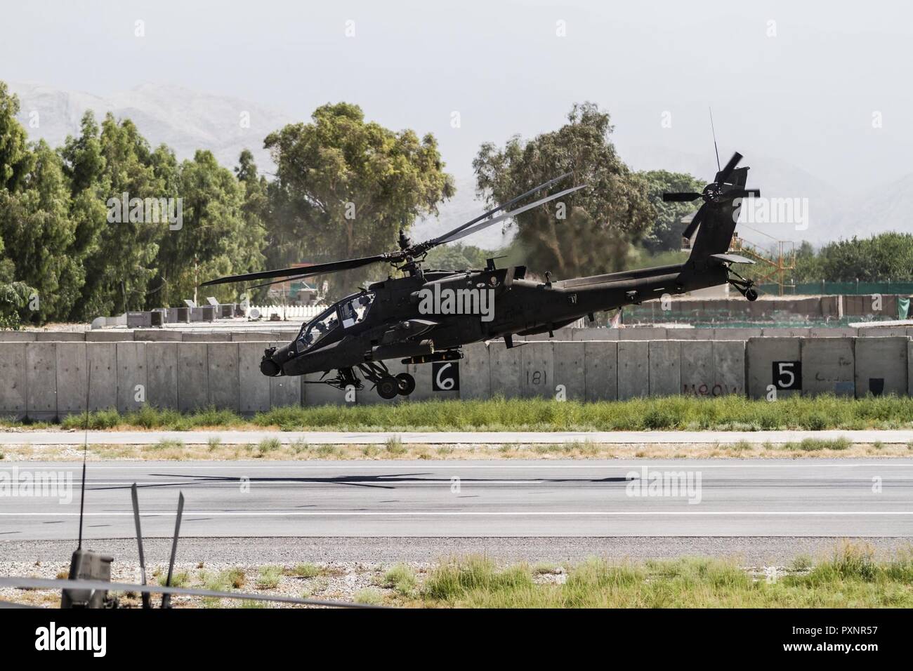 U.S. Army AH-64E Apache helicopter pilots assigned to Task Force ...