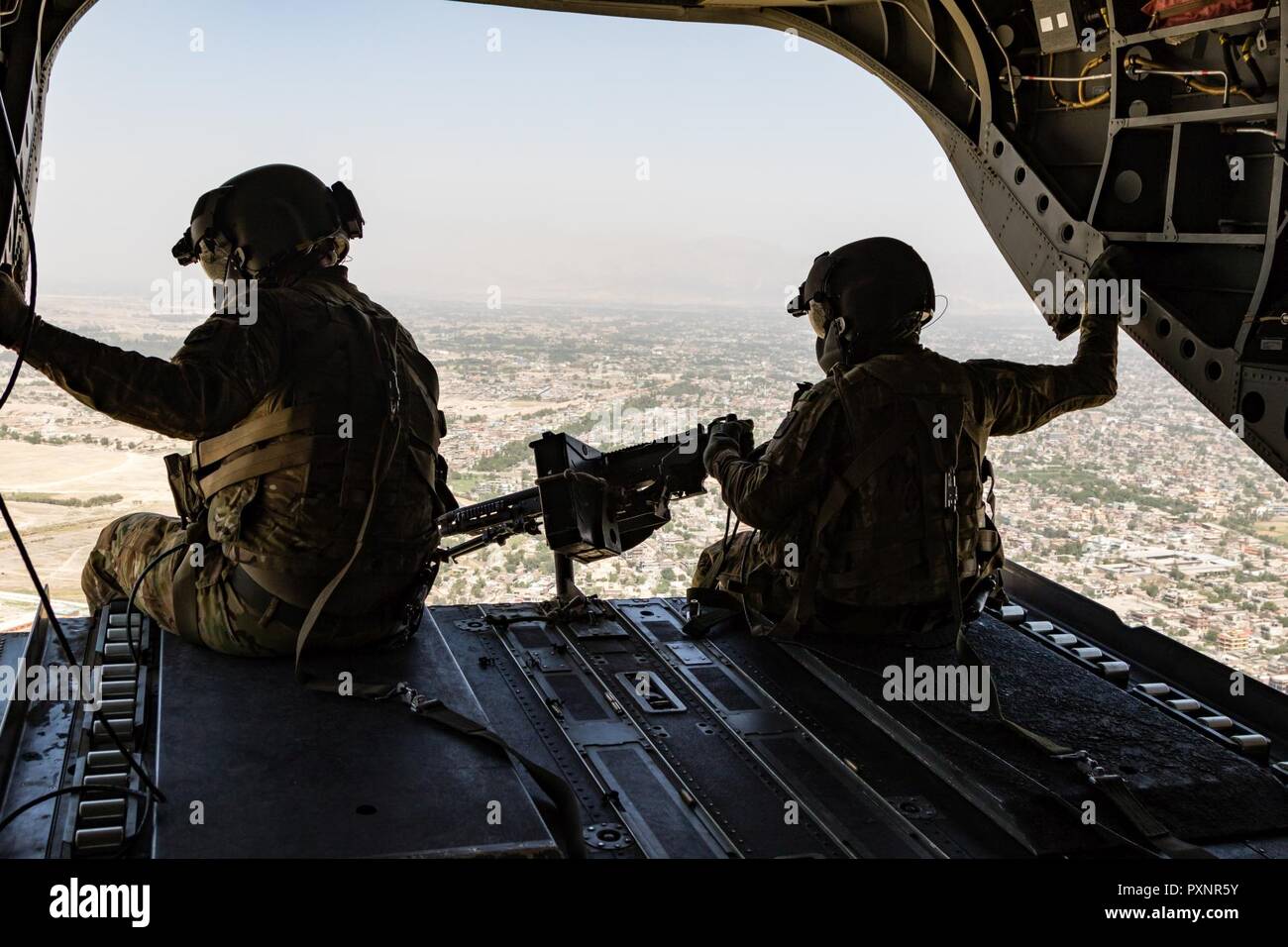 U.S. Army CH-47 Chinook helicopter crew chiefs assigned to Task Force ...