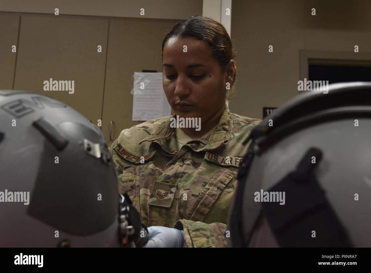 Staff Sgt. Carmen Lopez-Torres, an aircrew flight equipment technician ...