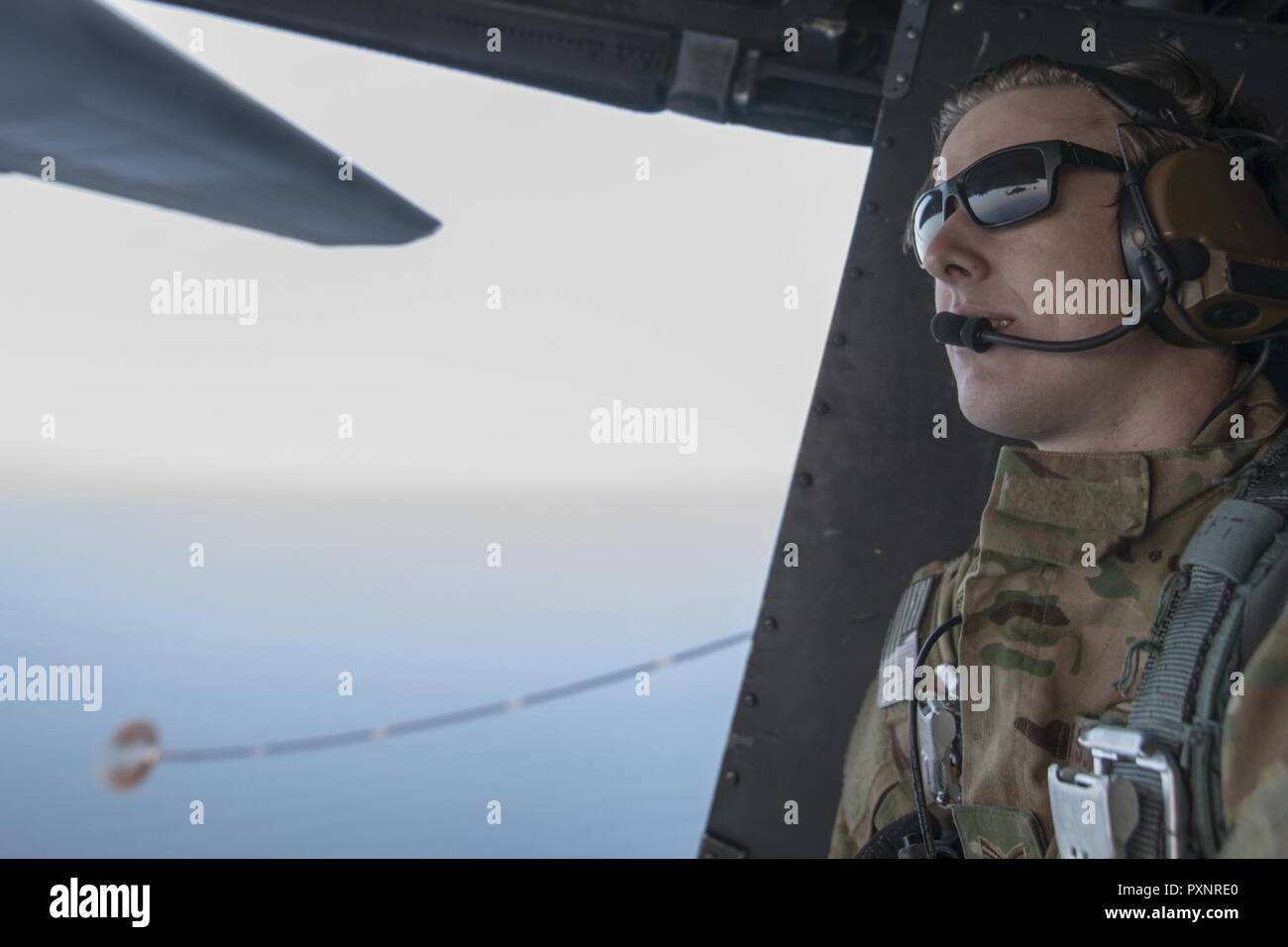 A loadmaster from the 353rd Special Operations Group observes a Japan ...