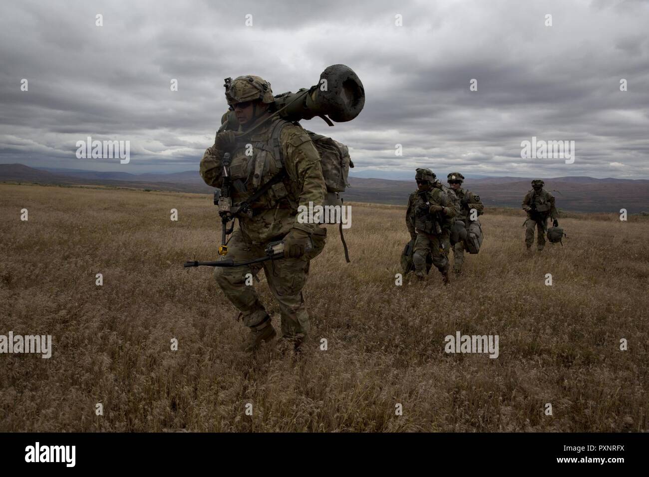 Soldiers of 2-2 Stryker Brigade Combat Team maneuver during Exercise ...