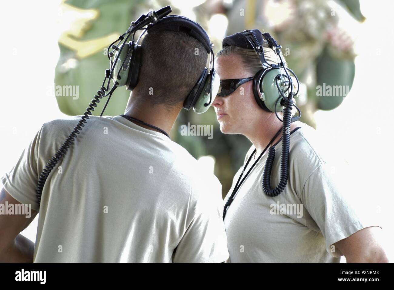 Members of the 189th Maintenance Group discuss aircraft and takeoff ...