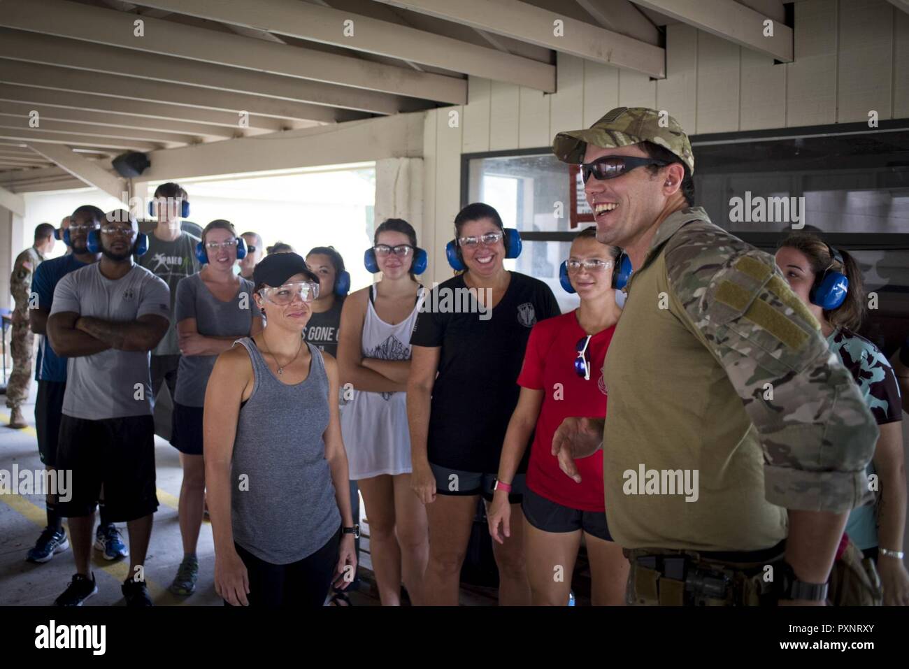 Special Operations Command Central spouses are briefed on proper gun ...