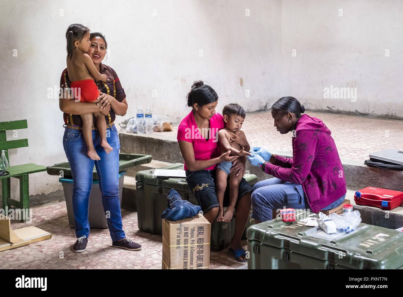 U.S. Army 1LT Evelyn Nguedia performs hemoglobin test to determine the ...