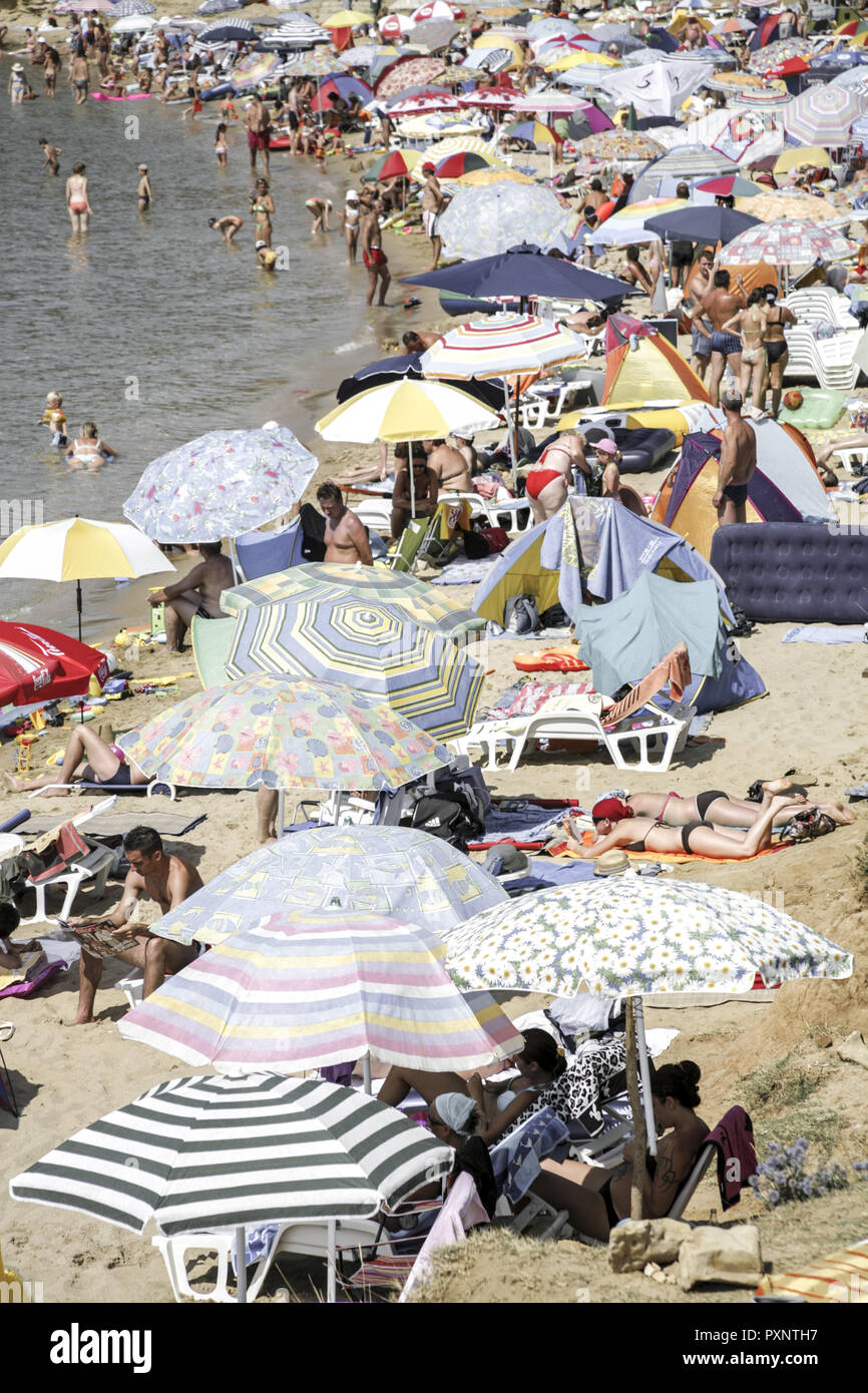 Croatia. Island Rab.Umbrelas on the beach. Crowded beach. Paradise ...